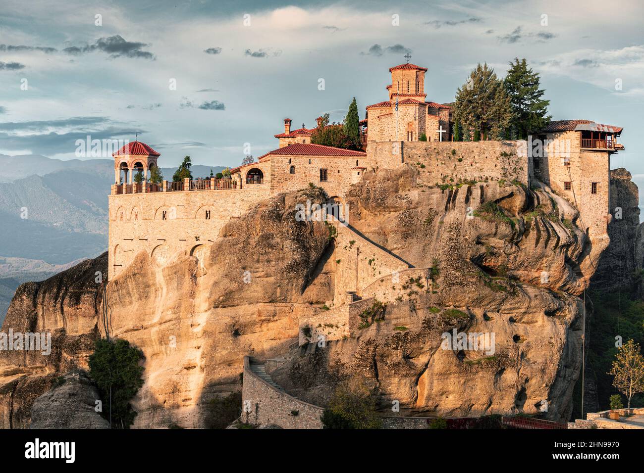 Monastery of Varlaam on top of a sheer cliff. The miracle of Meteora ...