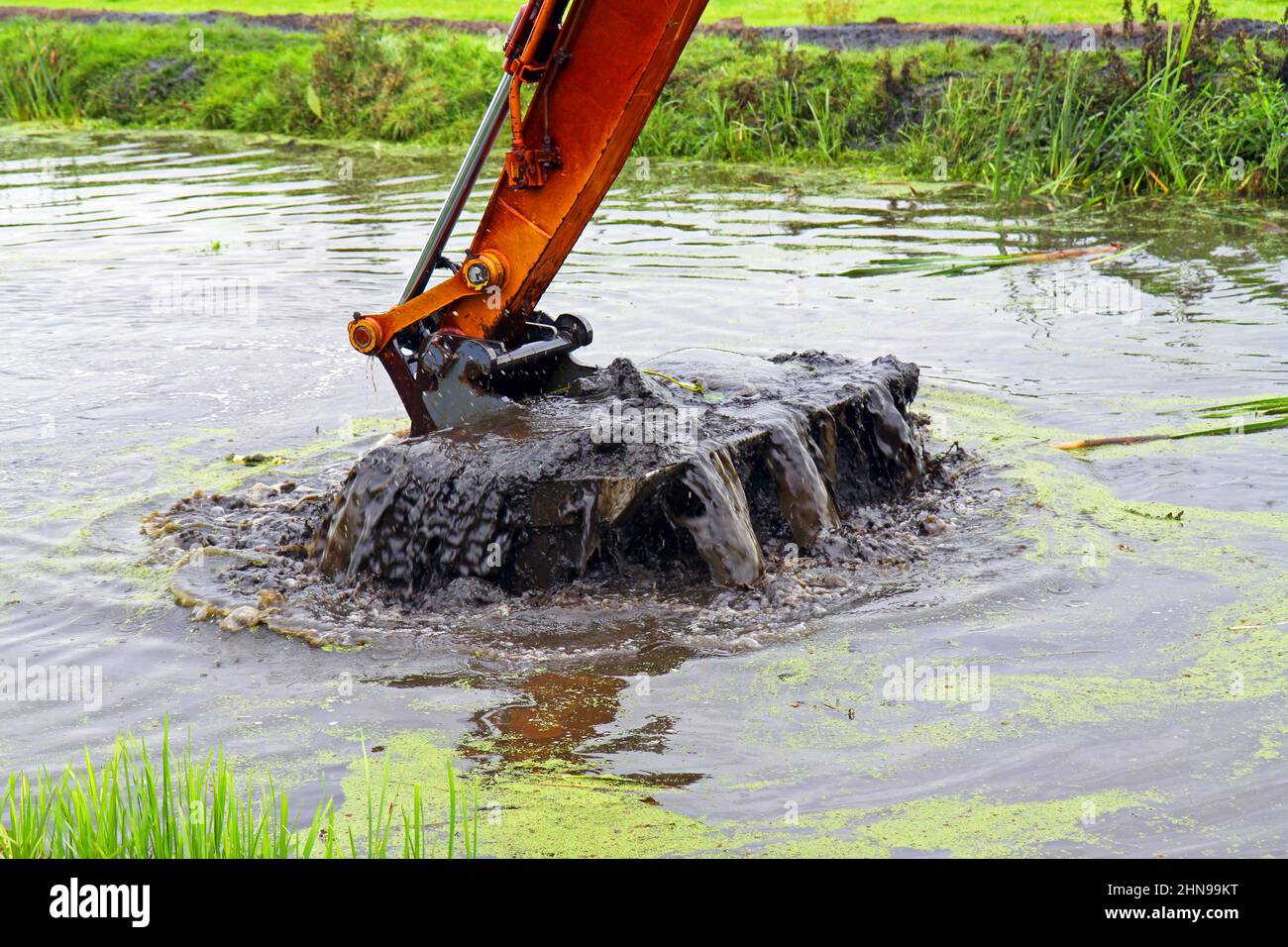 Small scale inland dredging works Stock Photo - Alamy
