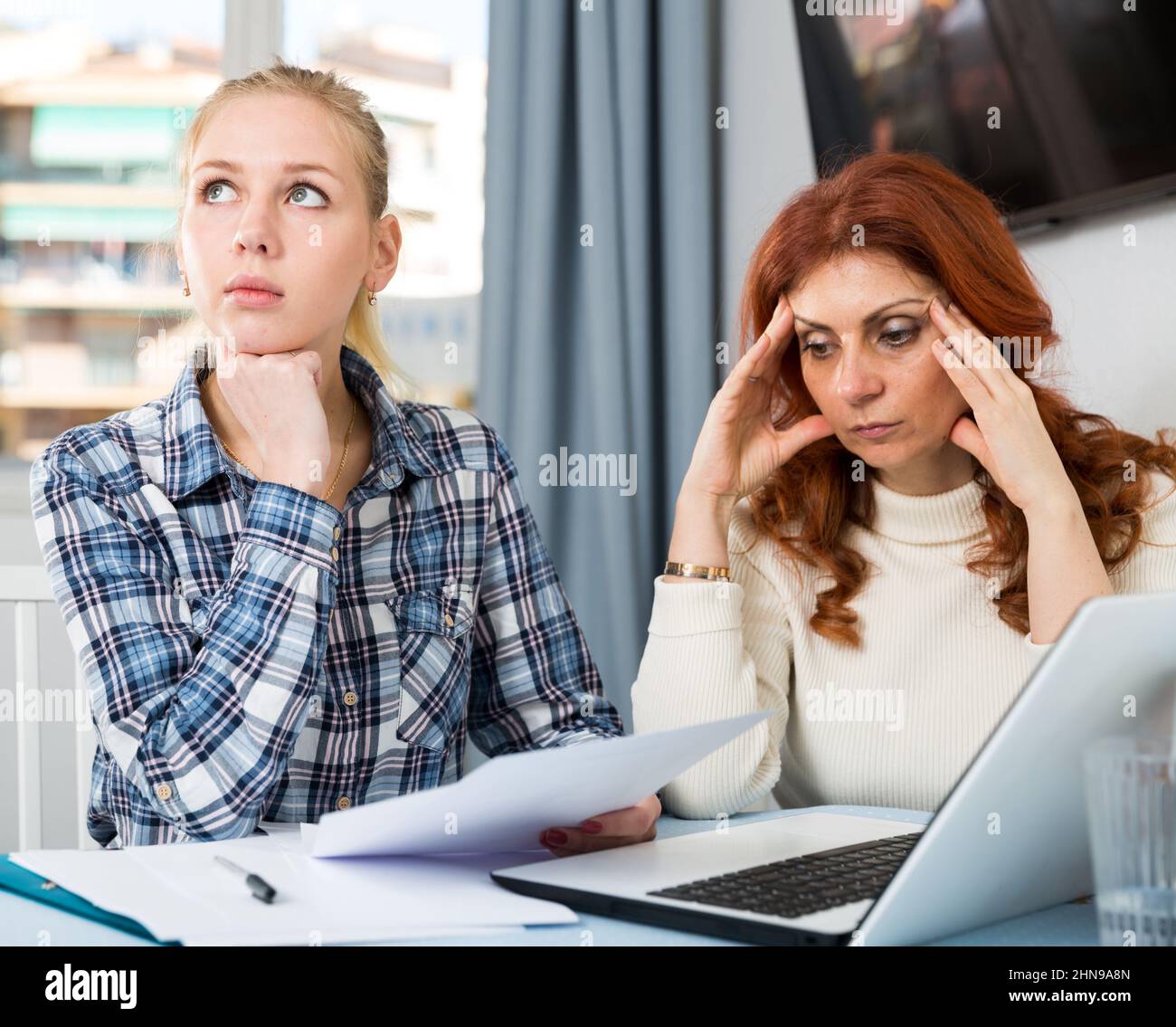 Woman emotionally complaining about poor academic performance of her ...