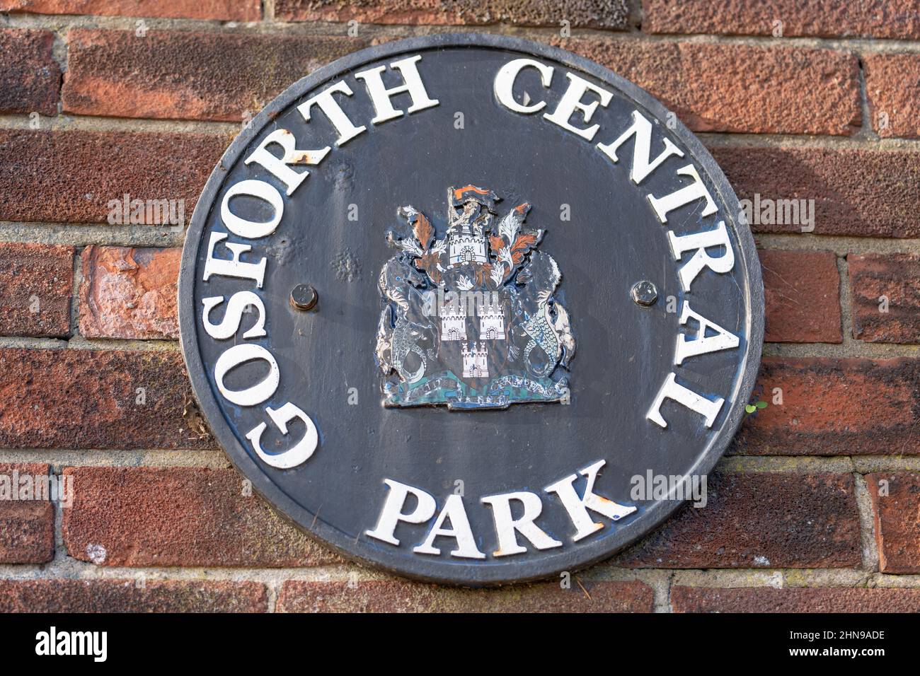 A sign on a wall names Gosforth Central Park, Gosforth, Newcastle upon ...