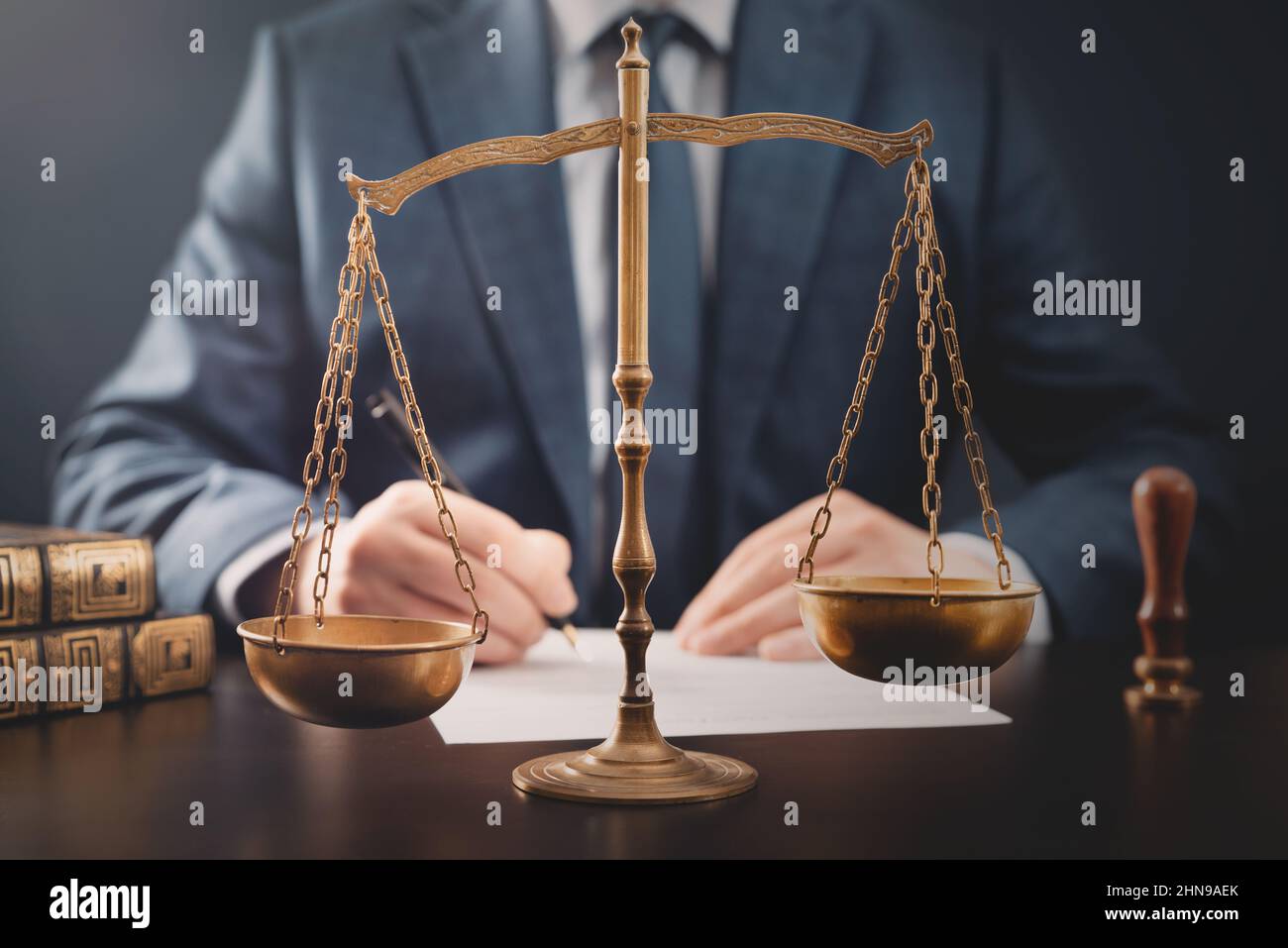 Lawyer working in the office. Law concept with weight scale Stock Photo ...
