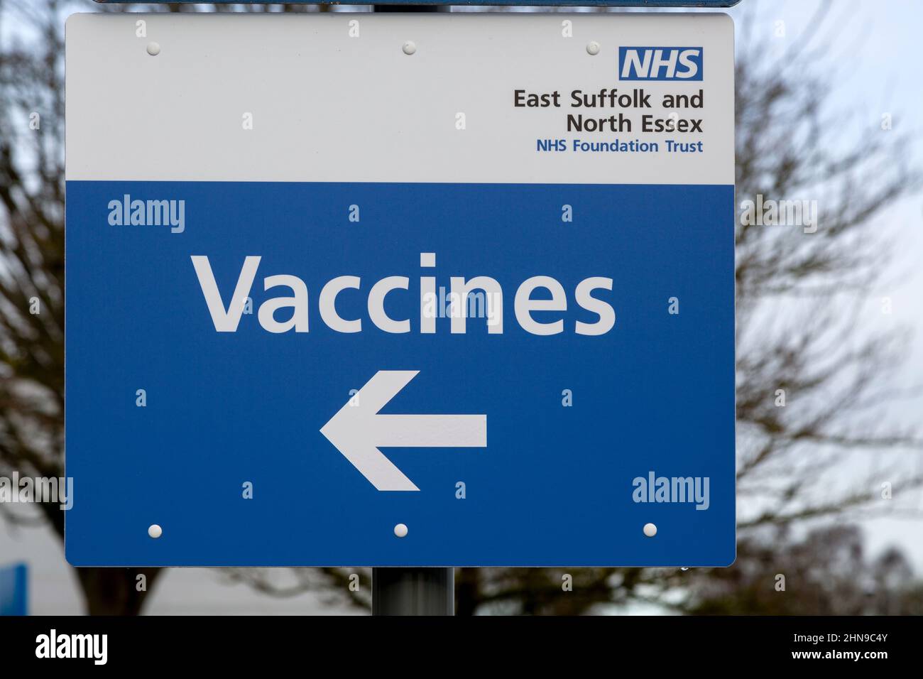 Sign with direction arrow 'Vaccines', Ipswich hospital, Suffolk ...