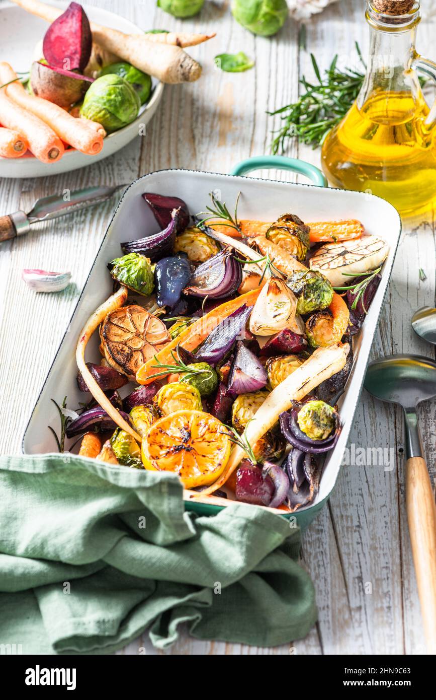 Mixed root vegetable roast with herbs. Healthy simple grill food Stock ...