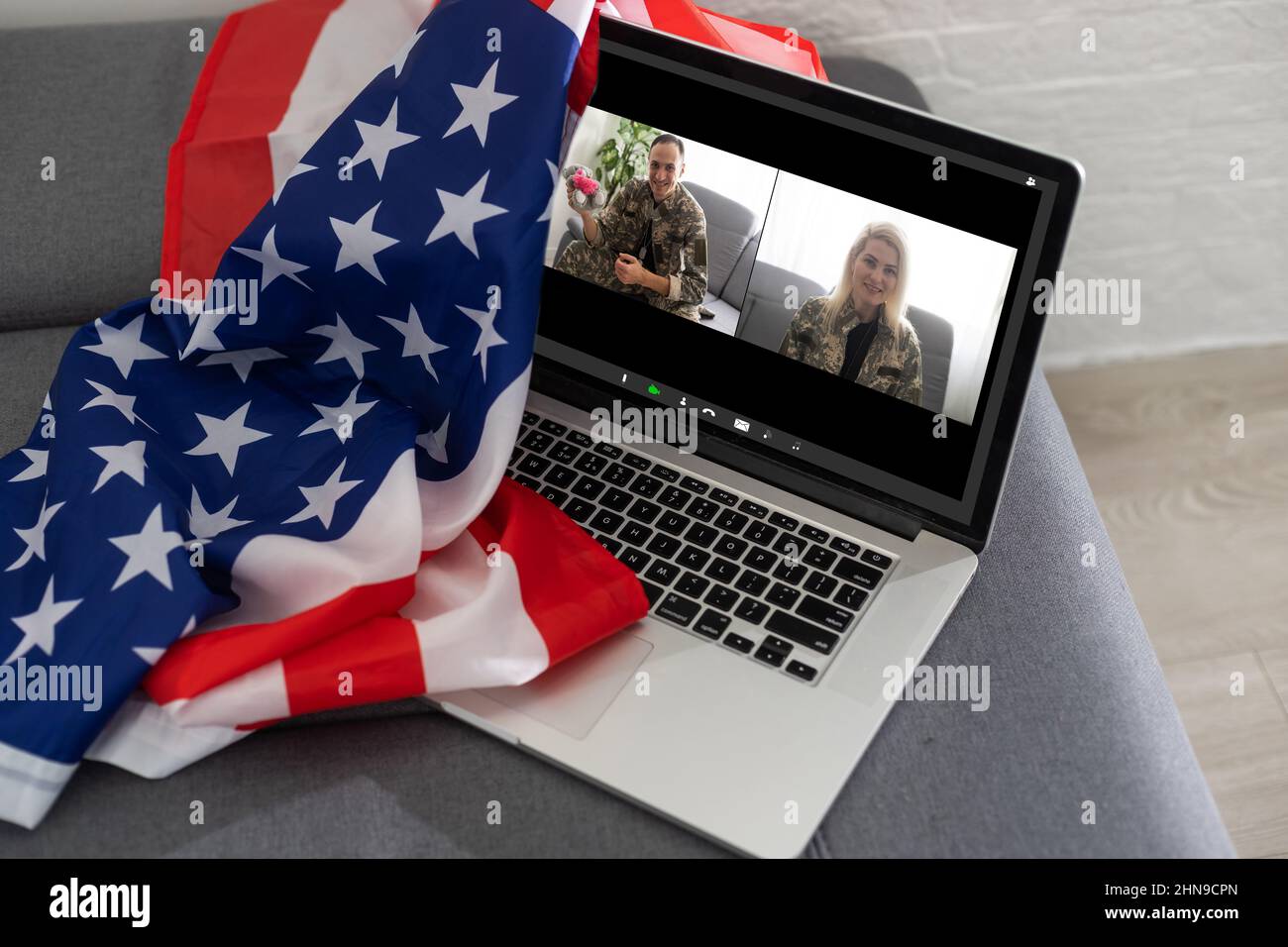military using laptop online conference with family Stock Photo - Alamy