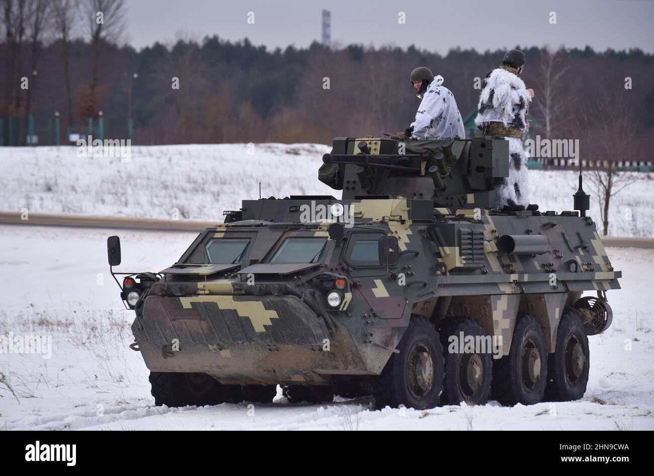 Ukrainian military ride on top of the BTR-4 "Bucephalus" during the ...