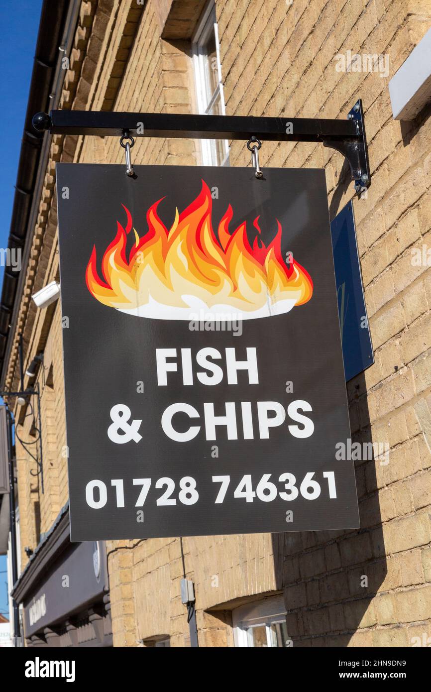 Fish and Chips sign sign outside chip shop, Wickham Market, Suffolk, England, UK Stock Photo - Alamy
