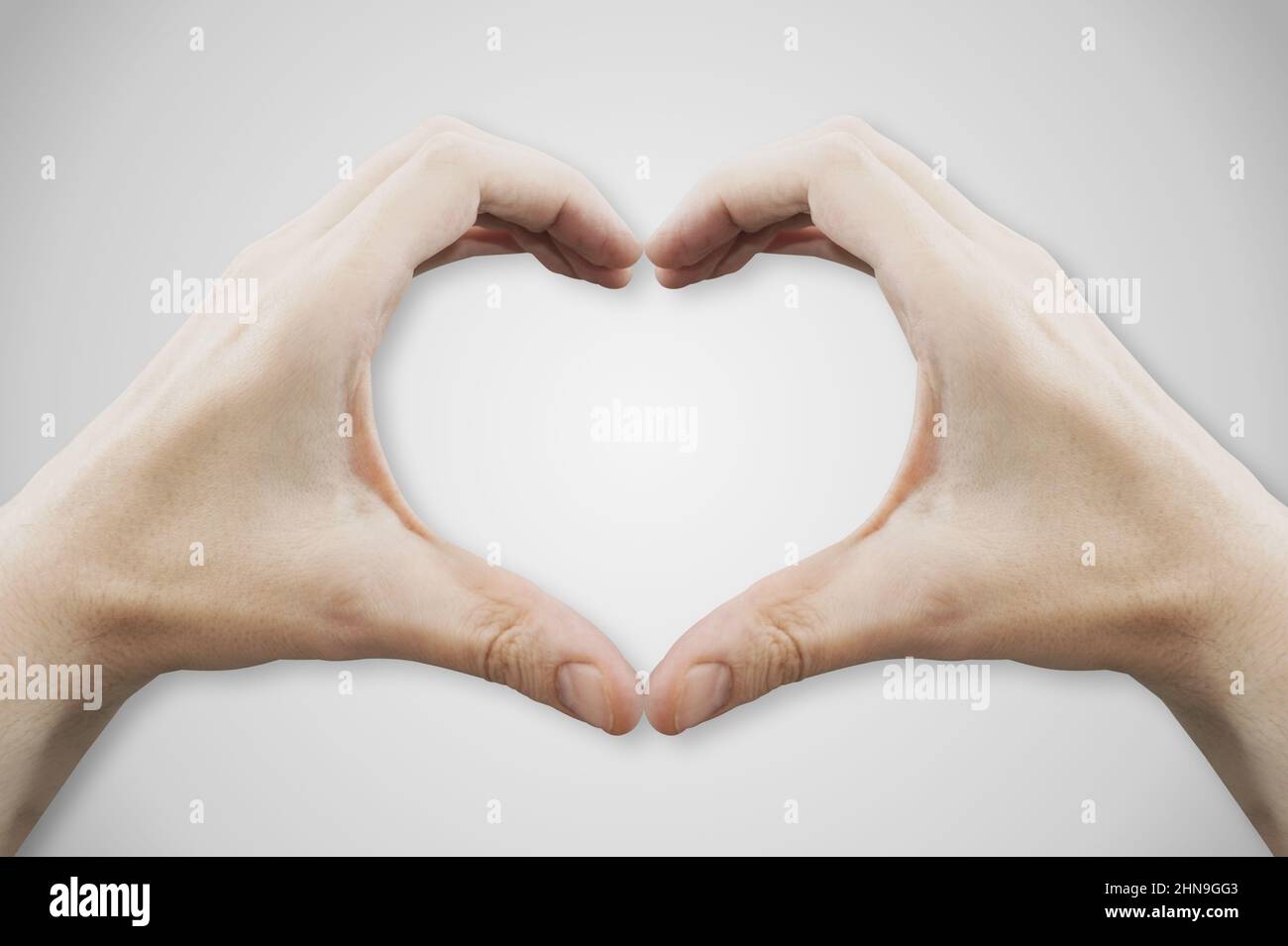 Hands forming heart shape hi-res stock photography and images - Alamy