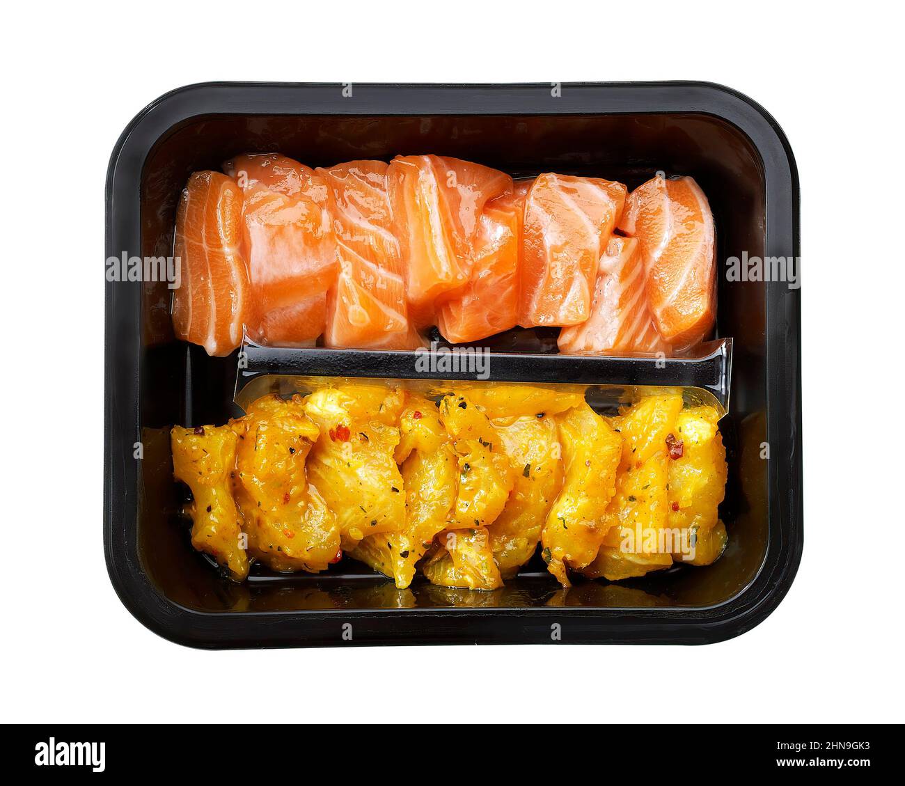 raw cod and salmon in plastic tray isolated on white Stock Photo - Alamy