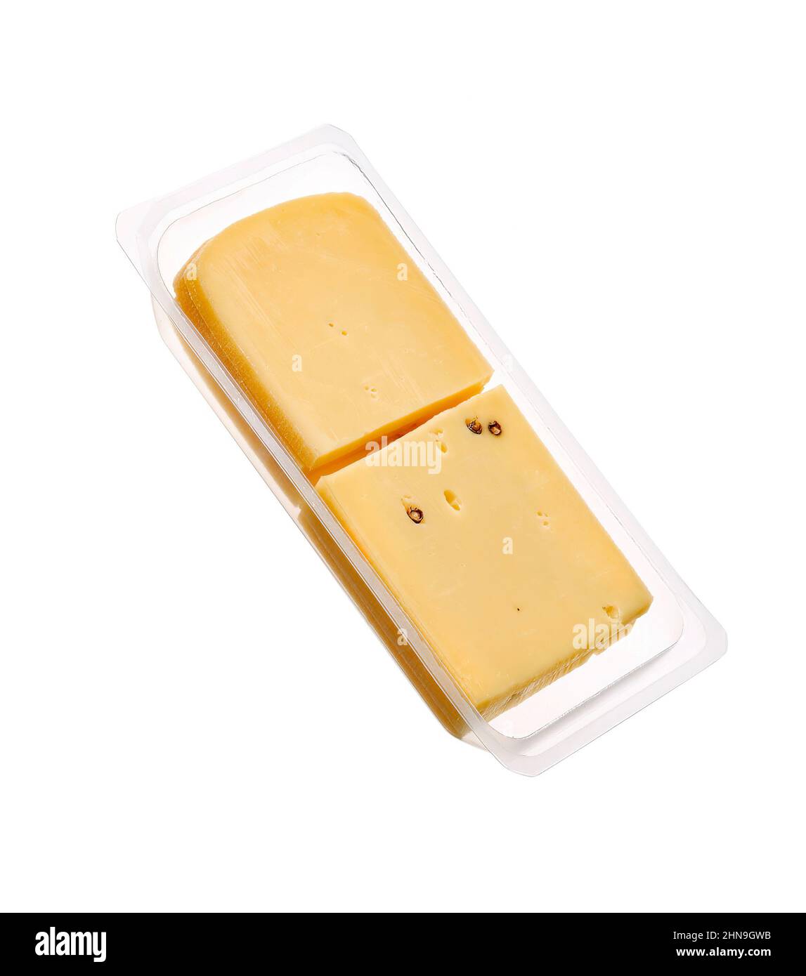 Raclette cheese slices in transparent plastic packaging, isolated on ...