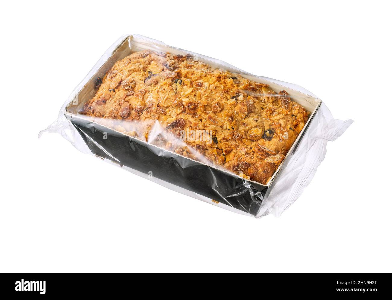 Nut Cake in plastic wrapper isolated on white Stock Photo - Alamy