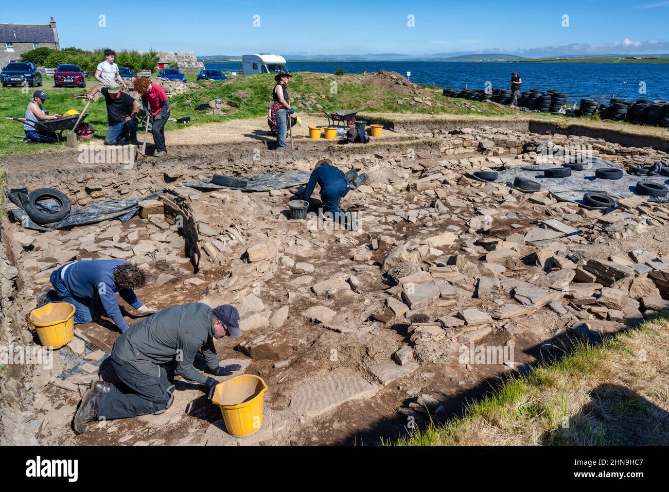 View of archaeological dig underway at Ness of Brodgar Neolithic site ...