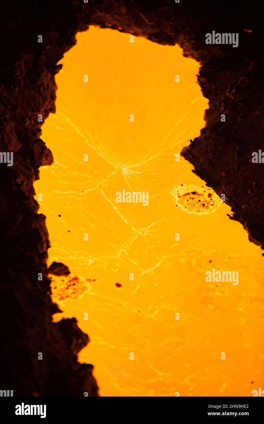 Liquid hot molten metal texture Stock Photo - Alamy