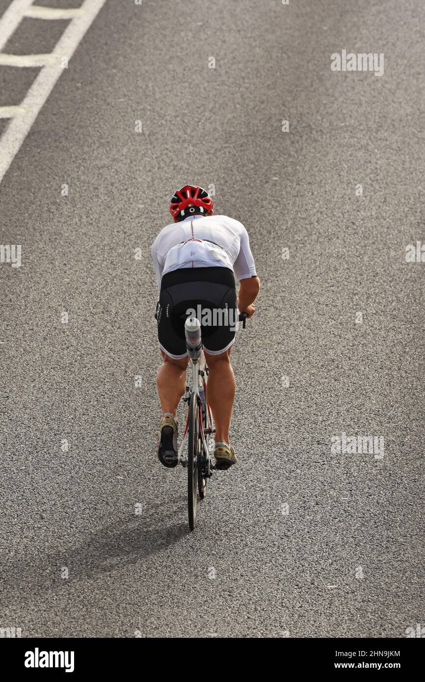 Man pedaling bicycle hi-res stock photography and images - Alamy