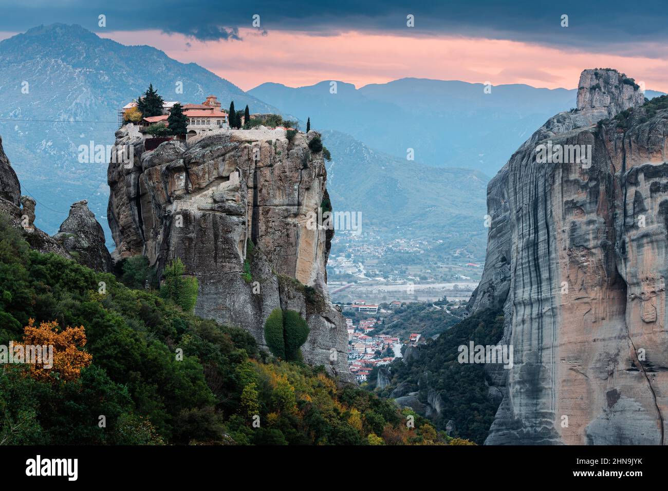 Scenic twilight view of the Monastery of the Holy Trinity in Meteora at ...