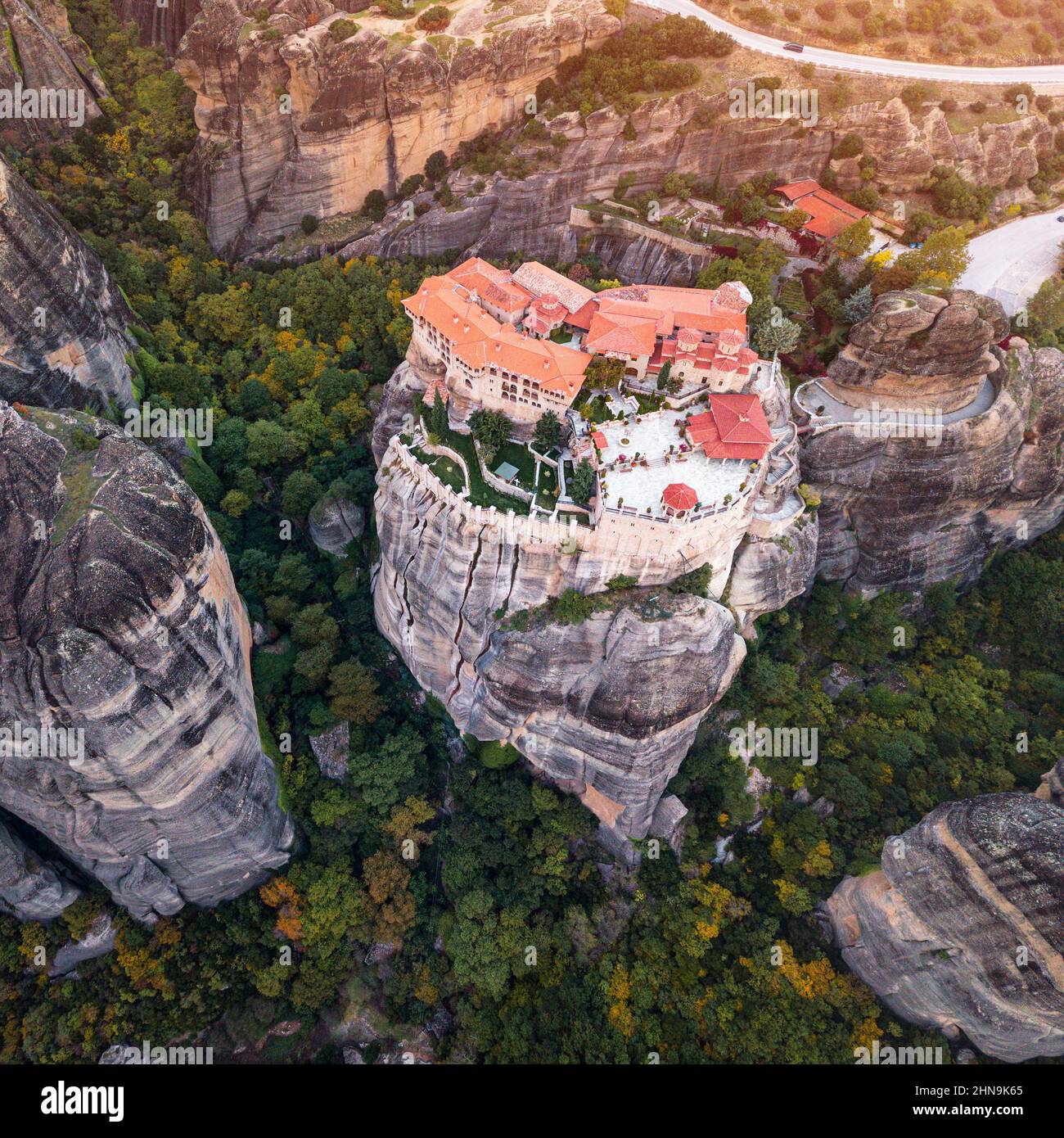 Aerial view of Monastery of Varlaam on top of a sheer cliff. The ...
