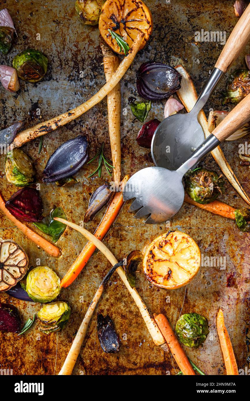 Mixed root vegetable roast with herbs. Healthy simple grill food Stock ...