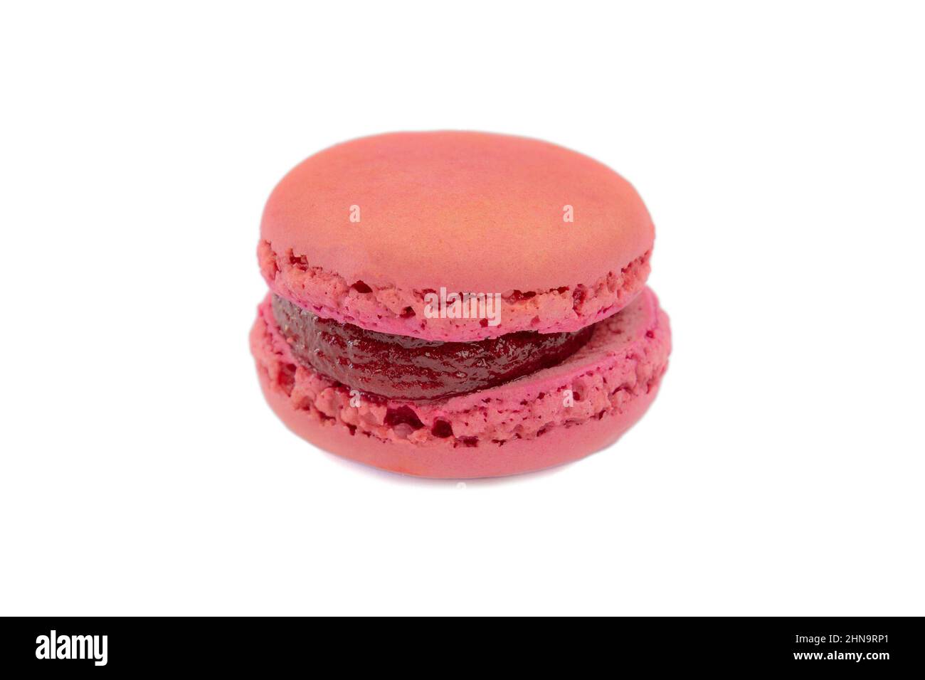 raspberry macaroon isolated on white background Stock Photo - Alamy