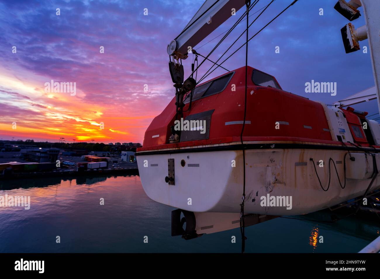A lifeboat at sunset with beautiful colors Stock Photo - Alamy