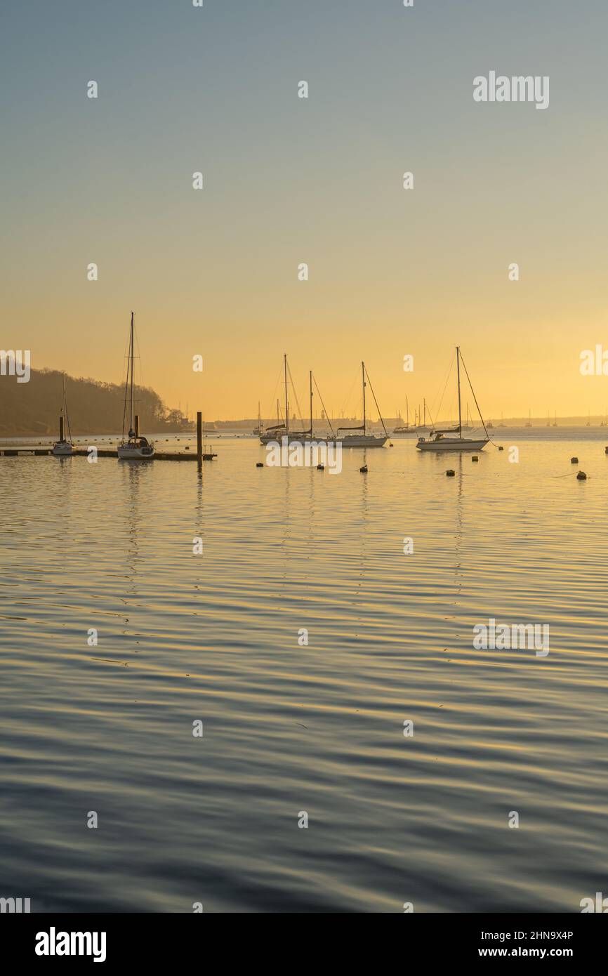 Looking down the River Medway from Lower Upnor at dawn on a winters ...