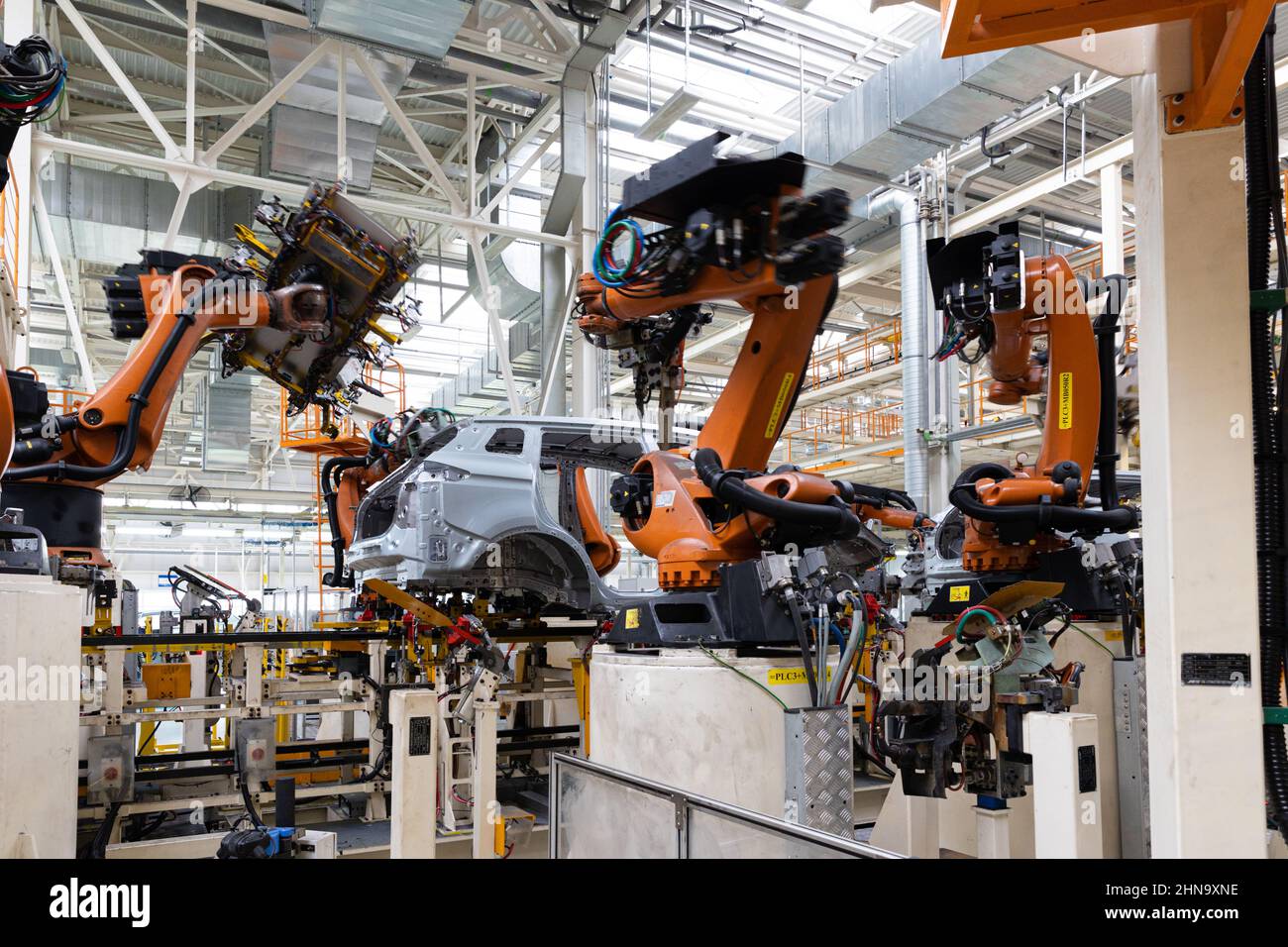 Photo of automobile production line. Modern car assembly plant. Auto ...