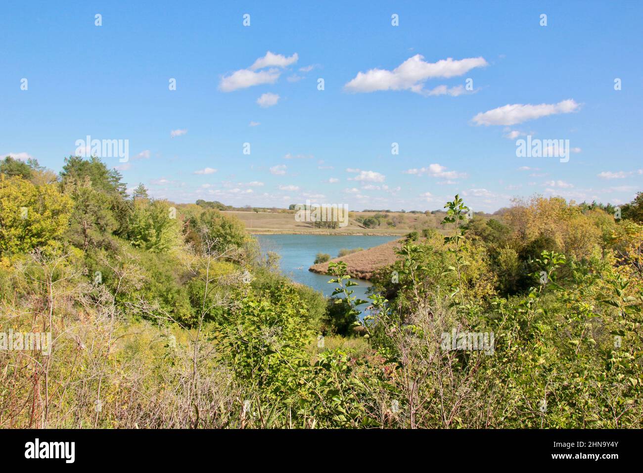 Beautiful daytime view of a small lake in a countryside valley Stock ...