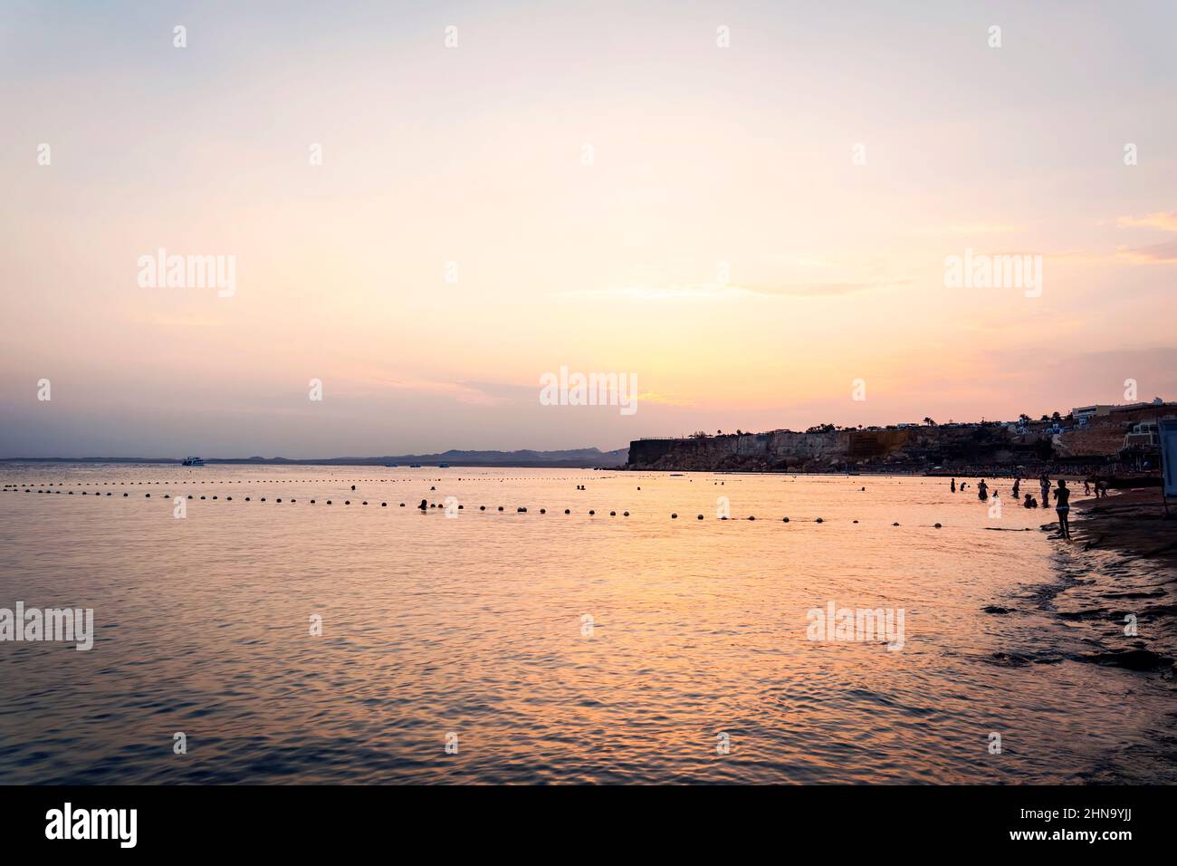 Sunrise over the red sea. Beautiful bright sky with sun rays and ...