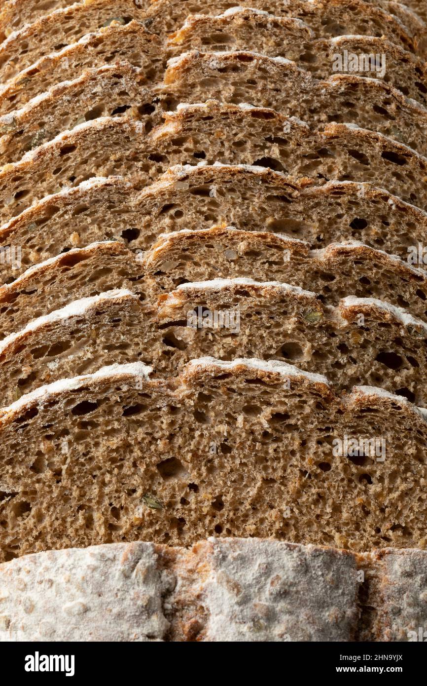 Sliced Pavé bread, multi grain bread, seen from above full frame close ...
