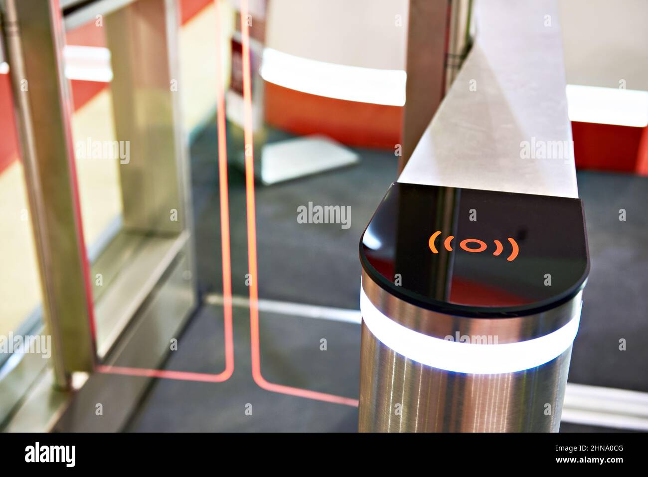 Modern baffle gate or turnstile stop red sign Stock Photo - Alamy
