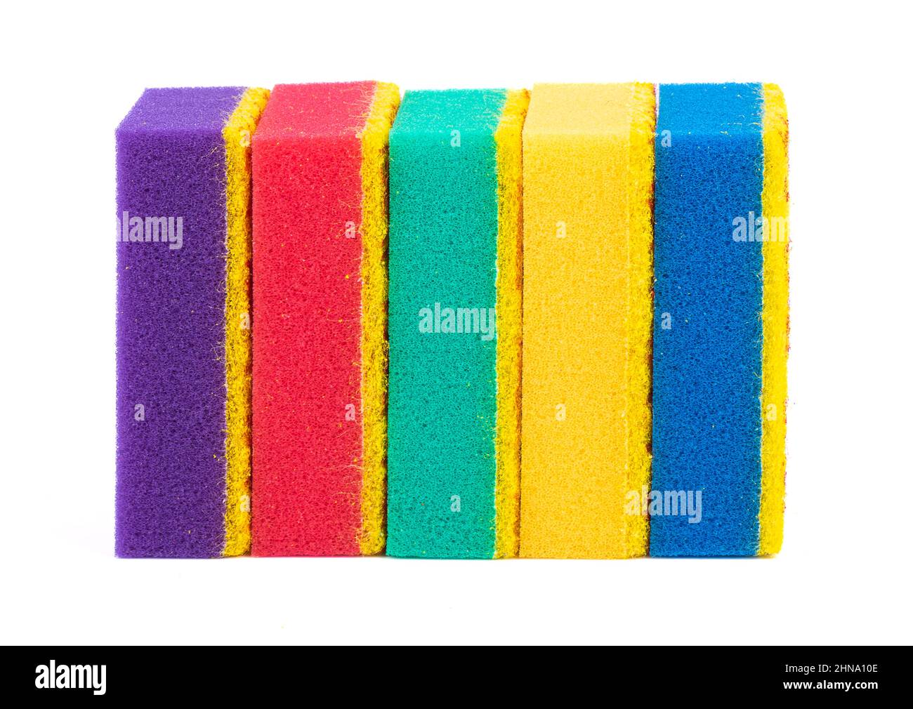 Close-up of multi-colored sponges for washing dishes on a white ...