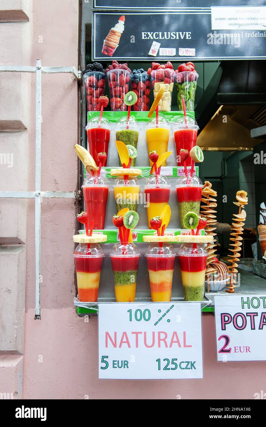 natural multifruit bright juices. Fruit smoothies are made in layers of ...