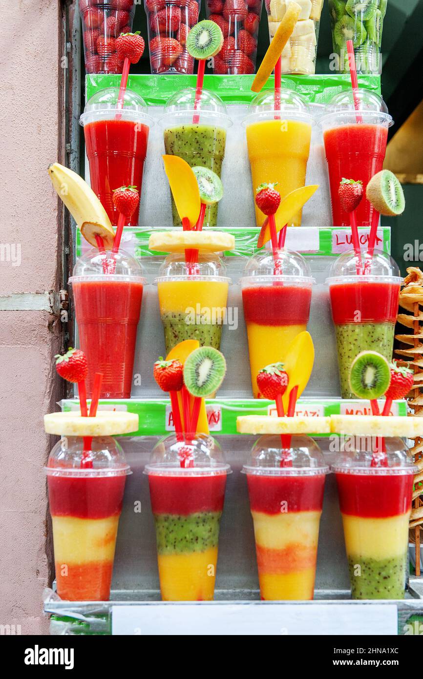 natural multifruit bright juices. Fruit smoothies are made in layers of ...