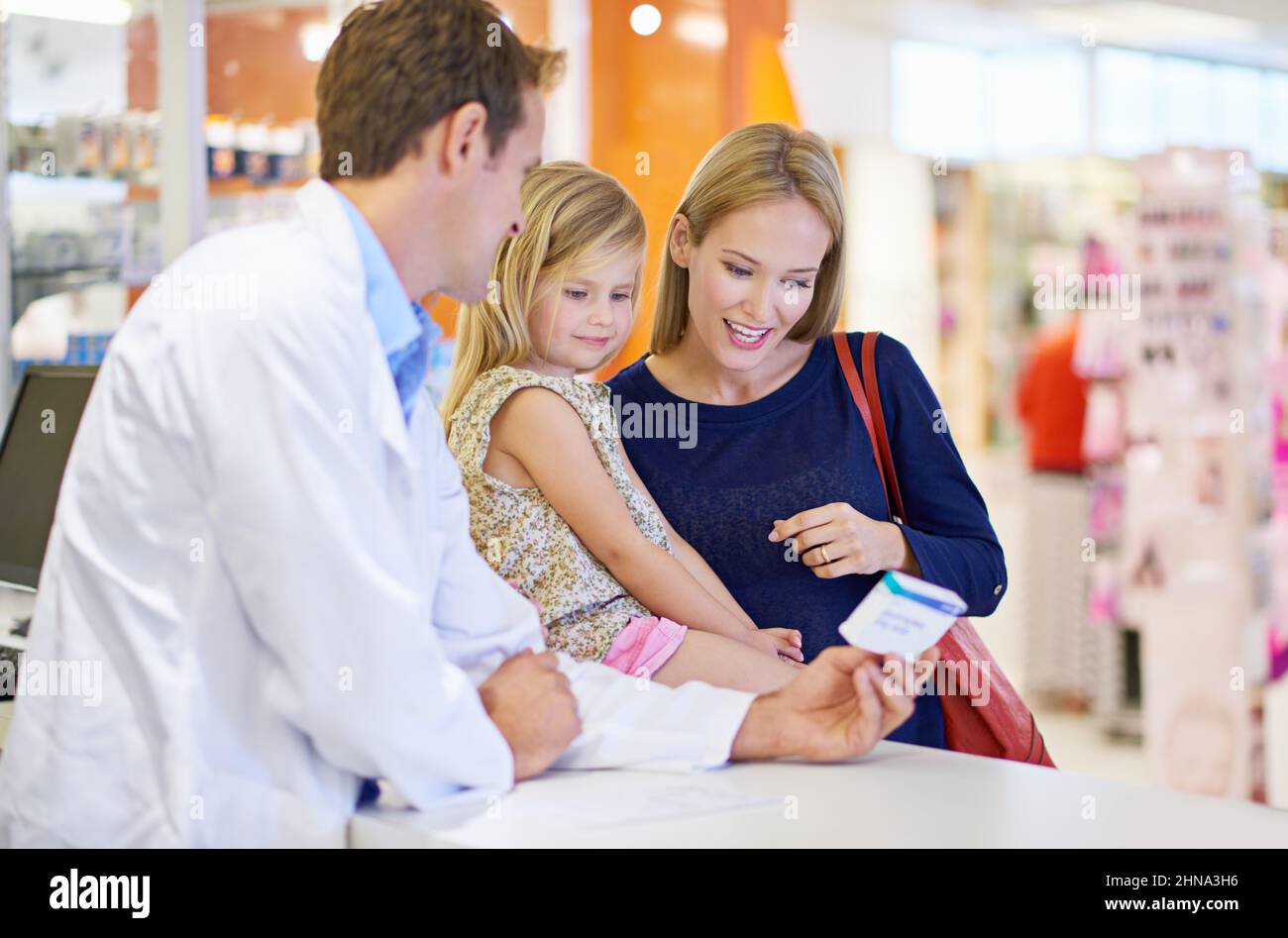 We have this one for kids.... A pharmacist giving medication to a ...