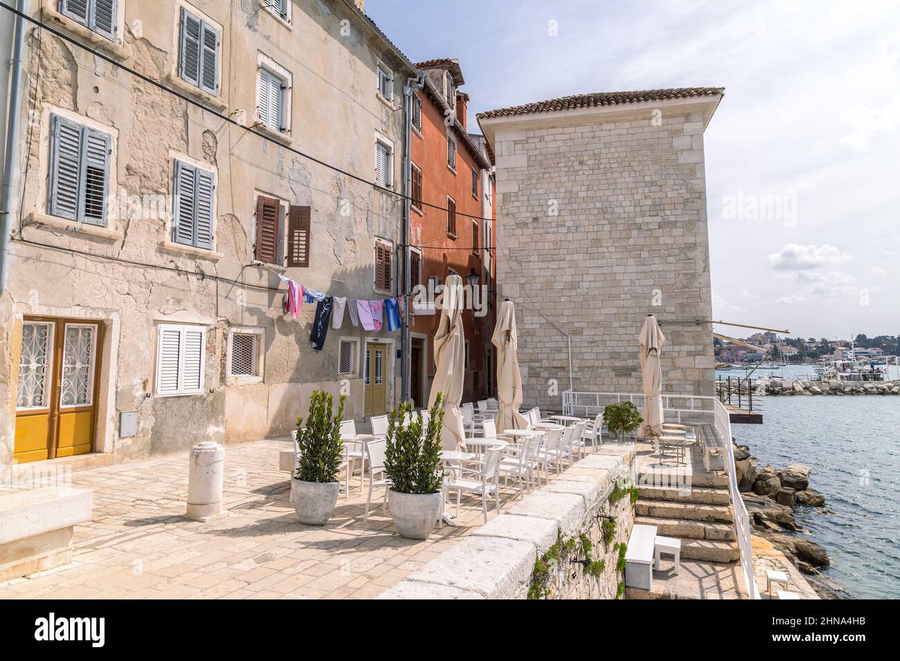 Historic buildings on the coast of Rovinj town on Adriatic sea, one of ...