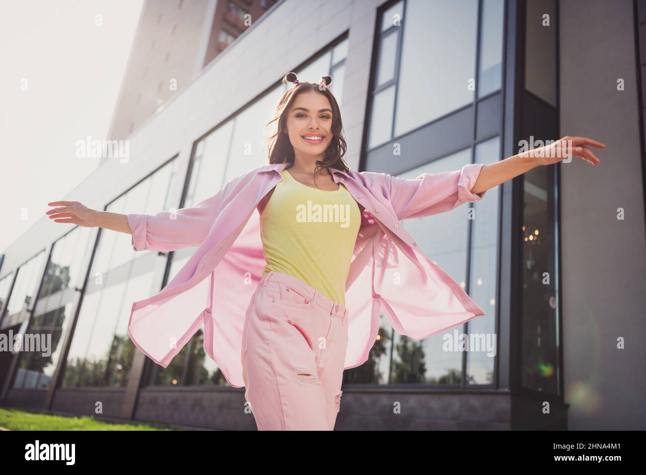 Portrait of attractive cheerful wavy-haired girl dancing having fun ...