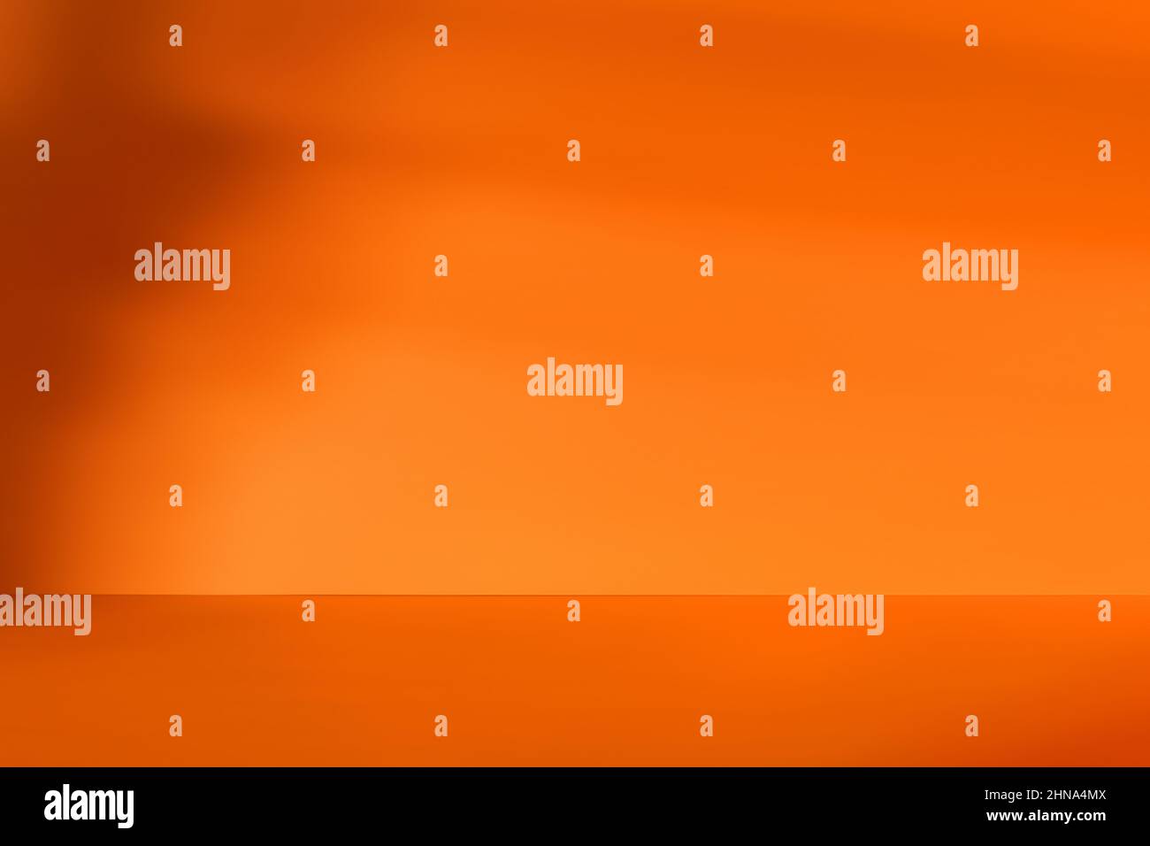 Empty orange room with deep artistic shadow. Minimalistic space concept ...