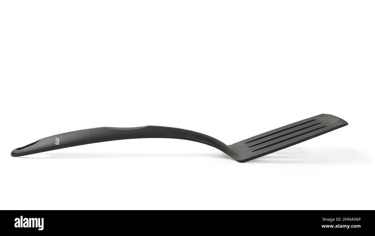 Black spatula for cooking. Side view isolated on white with clipping ...