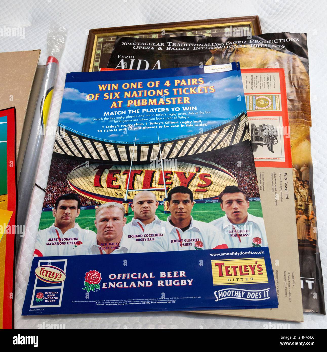Pile of various posters - Tetley's Bitter rugby ticket offer poster ...