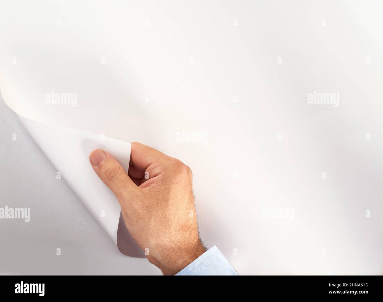 Hand turn page hi-res stock photography and images - Alamy
