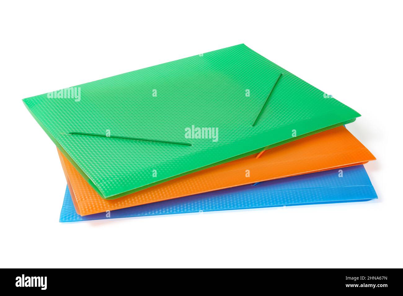 Three multi-colored folders for papers angle view. Isolated on white ...