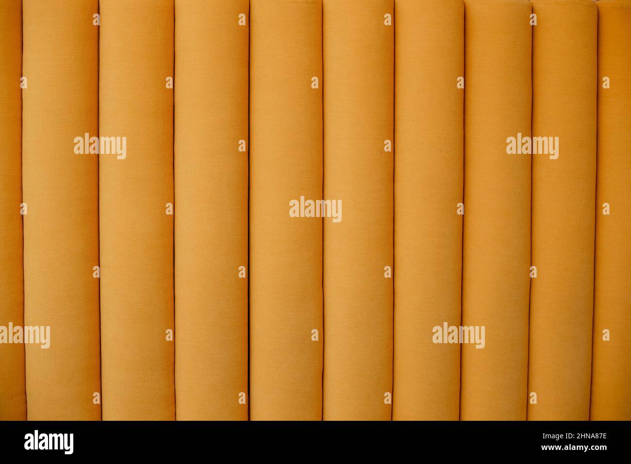 Macro background yellow velour textile. Velvet sofa with soft stripes ...