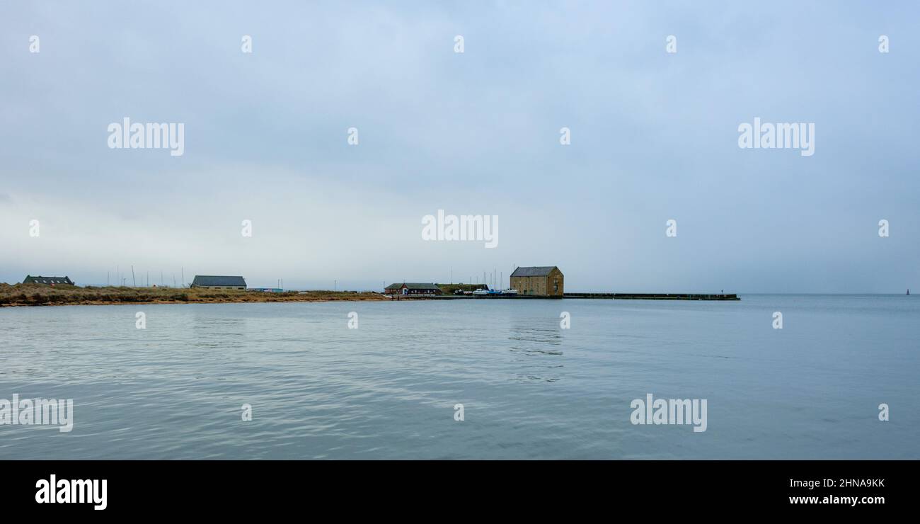 Looking across the bay from Elie to the harbour wall on the coast of ...