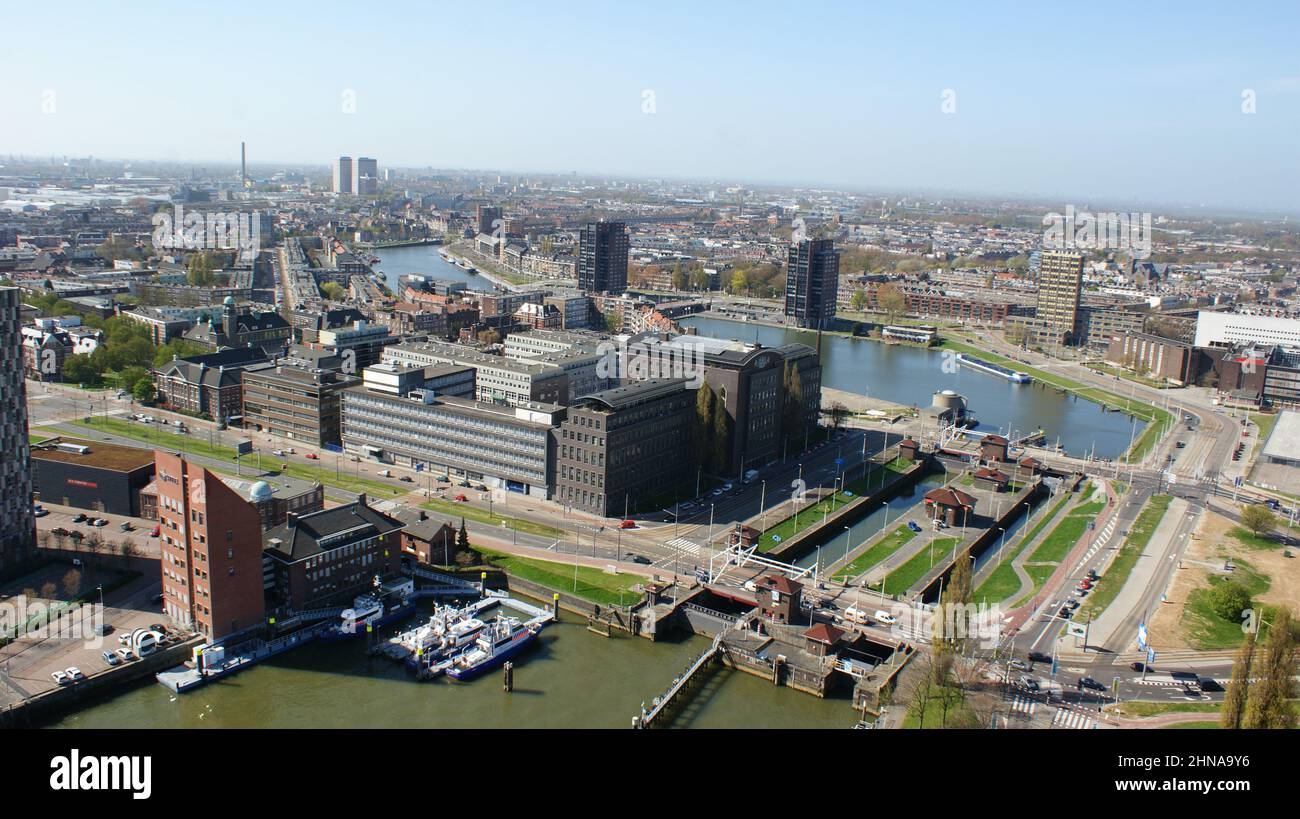 Aerial view of a city with harbor and roads of Rotterdam, Netherlands ...