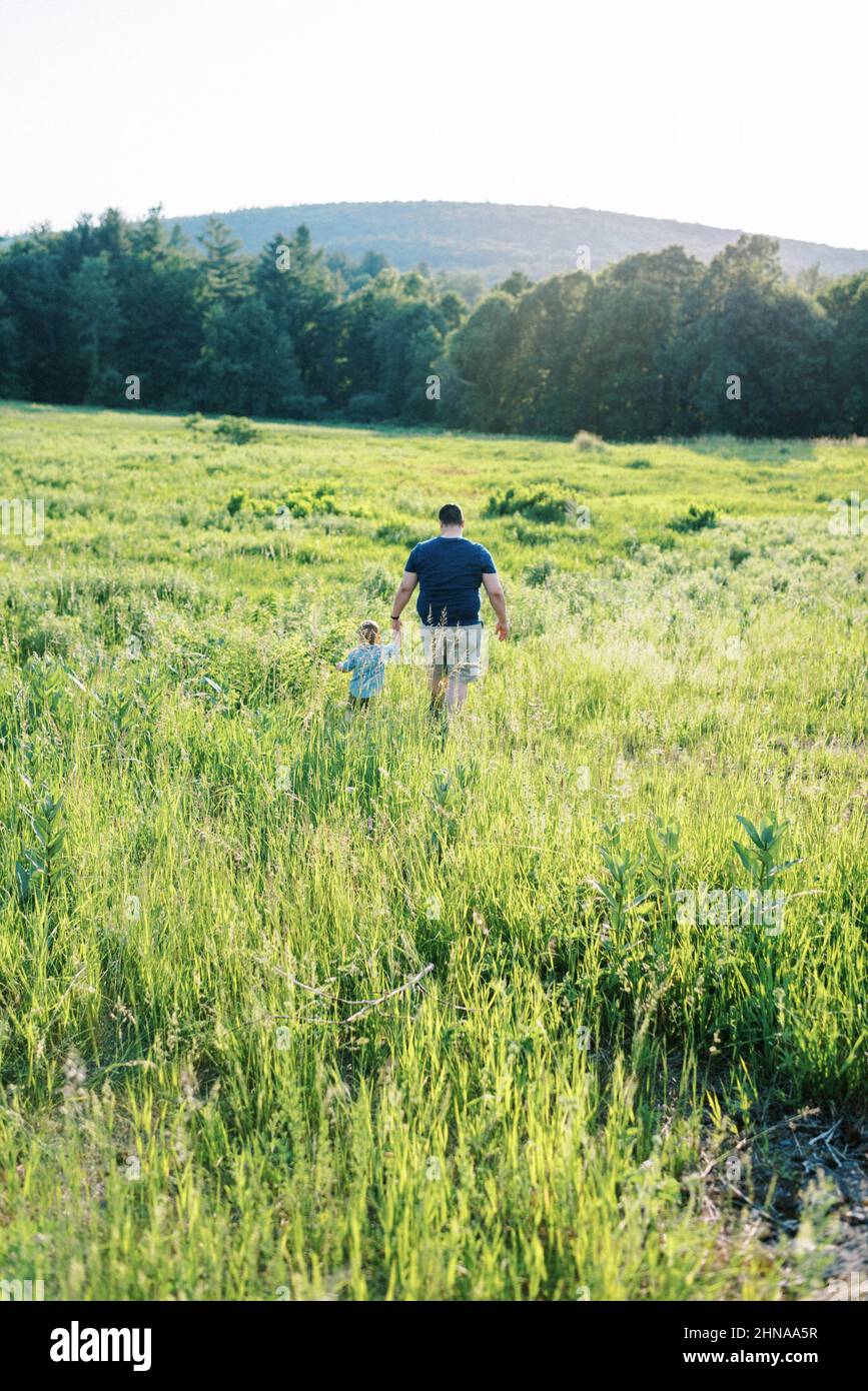 Man walking through fields hi-res stock photography and images - Alamy