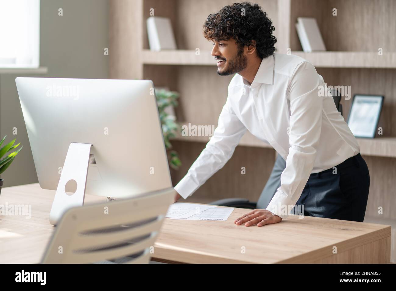 Young indian businessman having a vieo call Stock Photo - Alamy