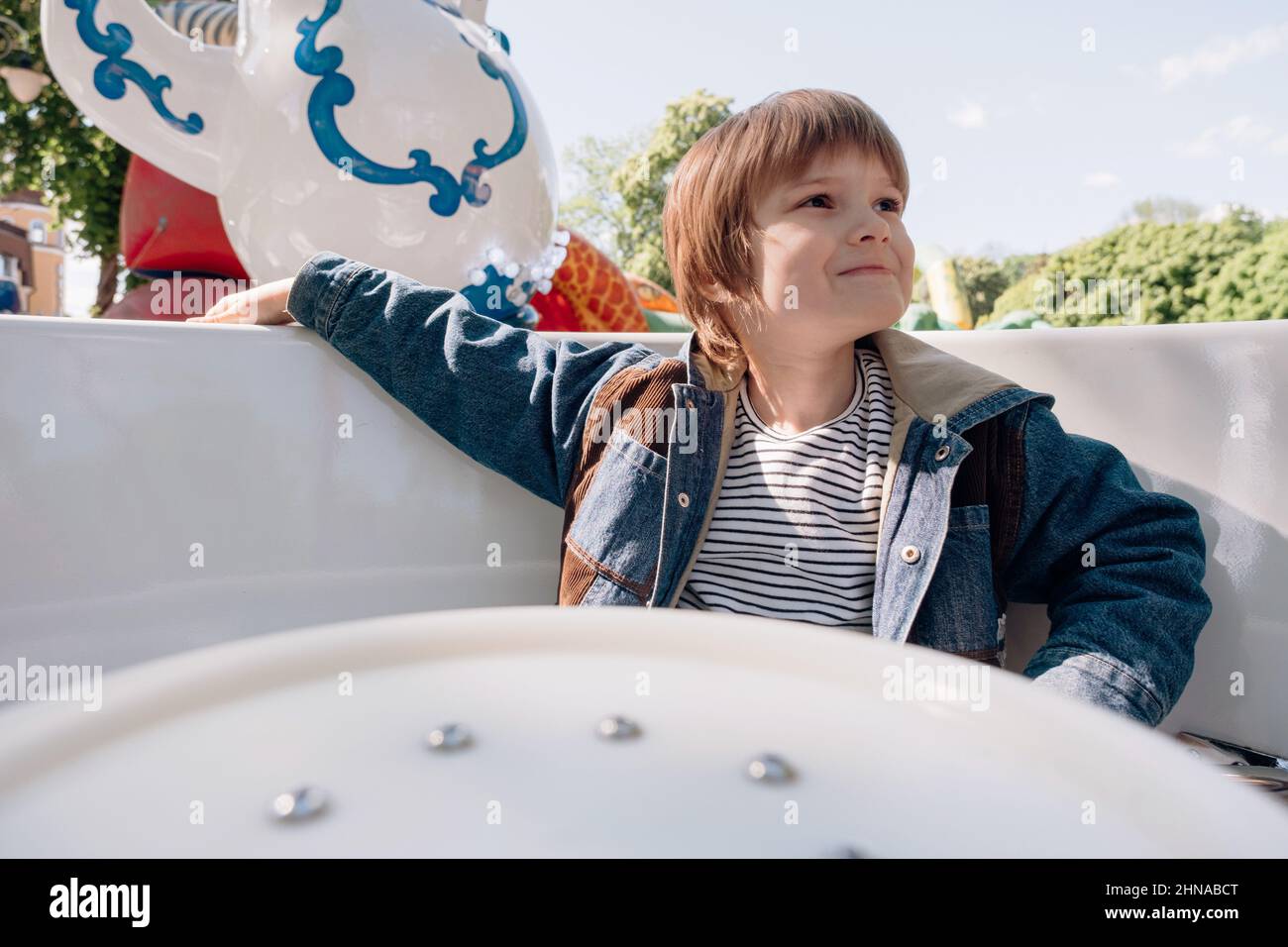 kid at the merry-go-round in the park Stock Photo - Alamy