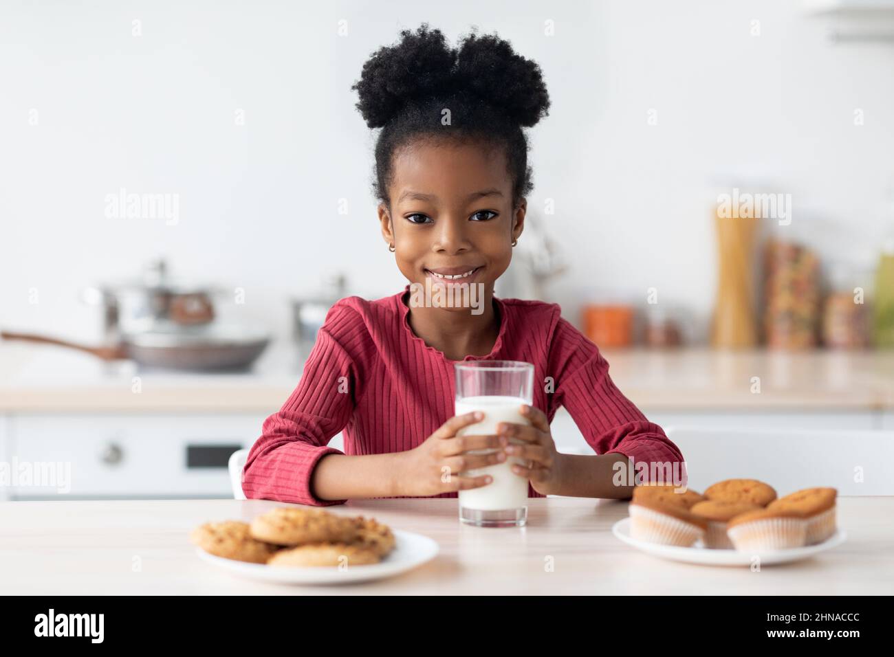 African child enjoying milk hi-res stock photography and images - Alamy