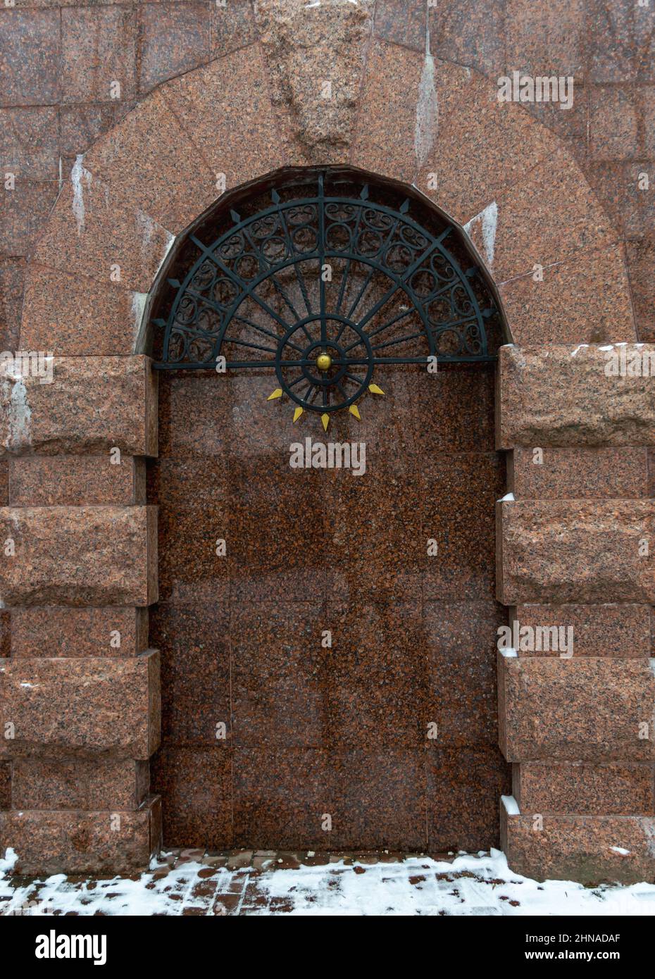 Marble-granite arch in the city wall. Elements of decor in urban ...