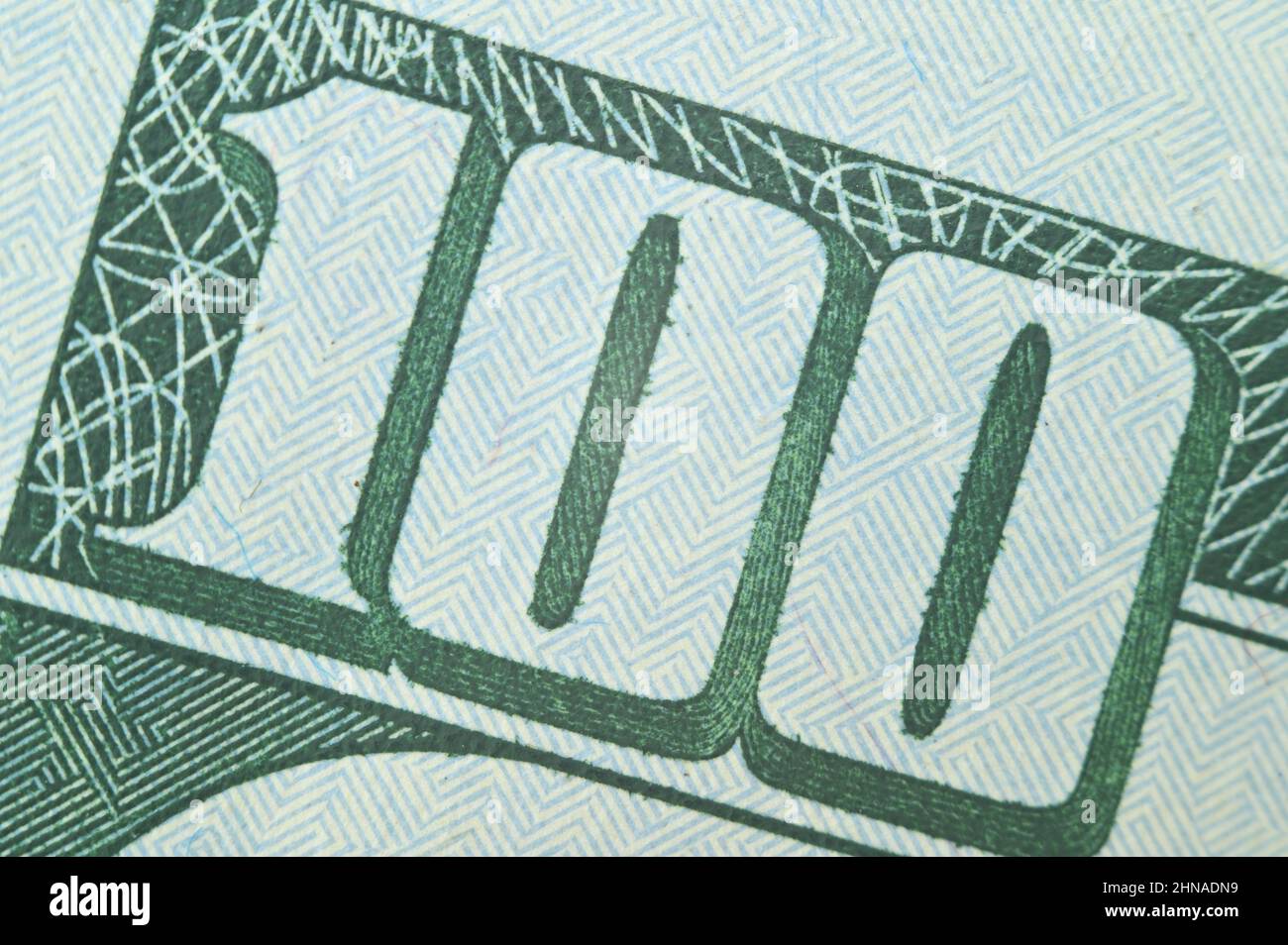 figure 100 is a close-up on a bill of one hundred American dollars of a ...