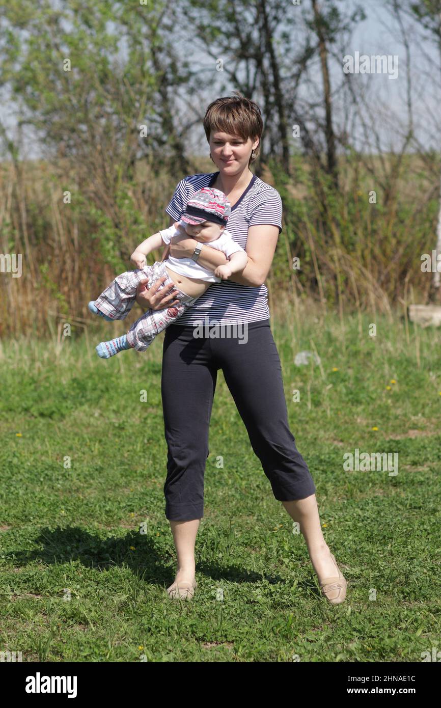 Rocking baby to sleep hi-res stock photography and images - Alamy