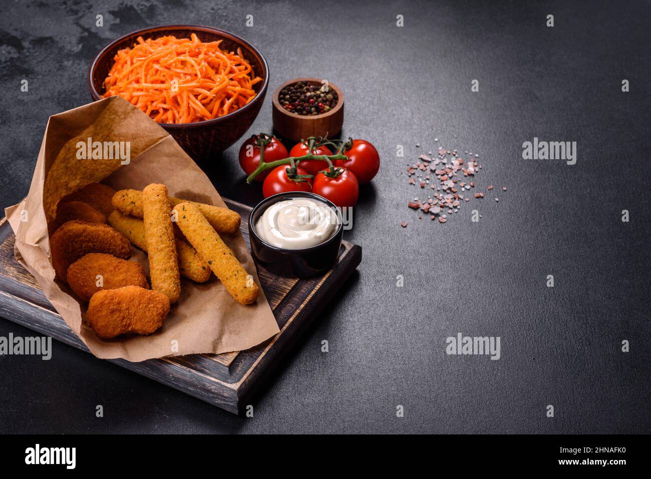 Fried crispy nutritious cheese or potato sticks. Snacks for beer Stock ...